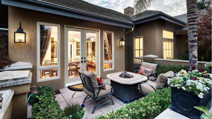 Living Room with Multiple Doors and Windows - LA Progressive