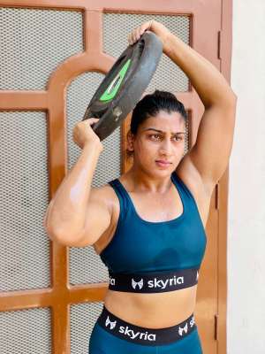 Rounak Gulia, a wrestling champion, breaks prejudice against married women. - LA Progressive