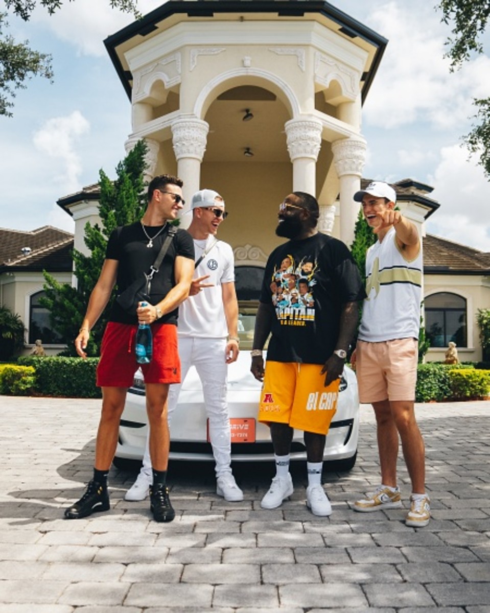 HighKey Clout and Hip-Hop Icon Rick Ross Give Away a Tesla - LA Progressive